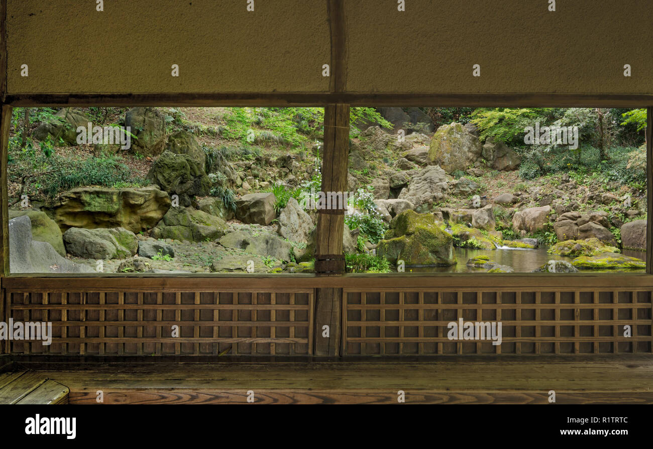 Takimi Japanese tea house overlooking a waterfall and stone islets with ...