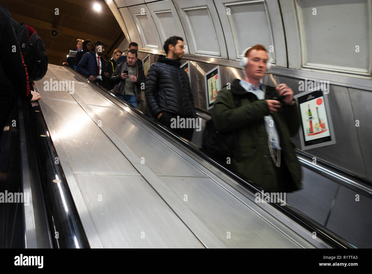 Tube commuters time, London commuters travelling down the Underground ...