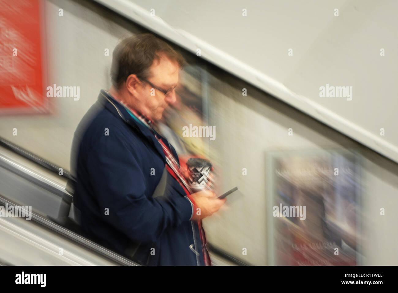 Tube commuters time, London male commuter travelling down the ...