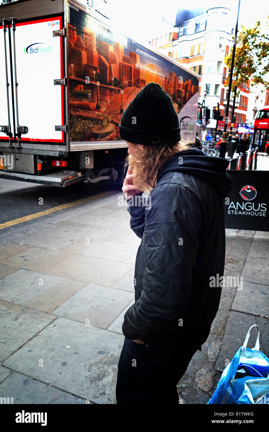 Homeless standing hi-res stock photography and images - Alamy
