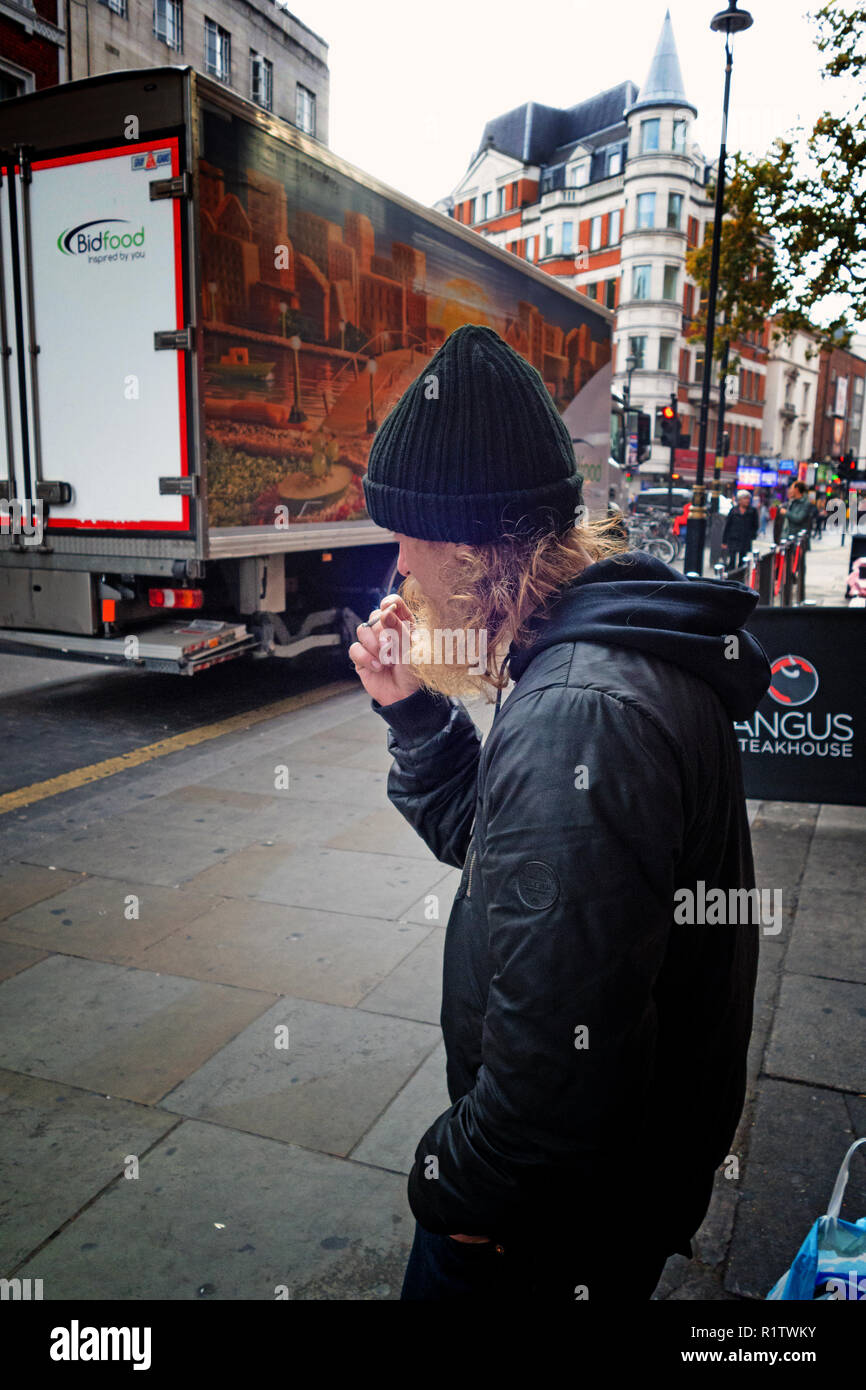 Homeless standing in street london hi-res stock photography and images ...