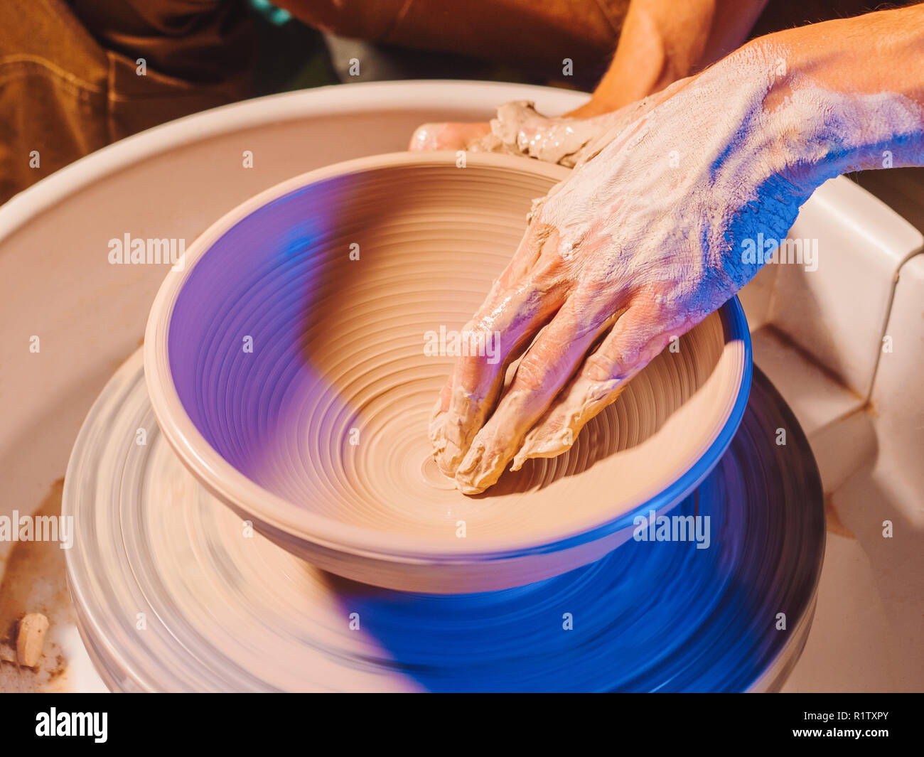 Creating earthenware and traditional pottery concept. Experienced male ...