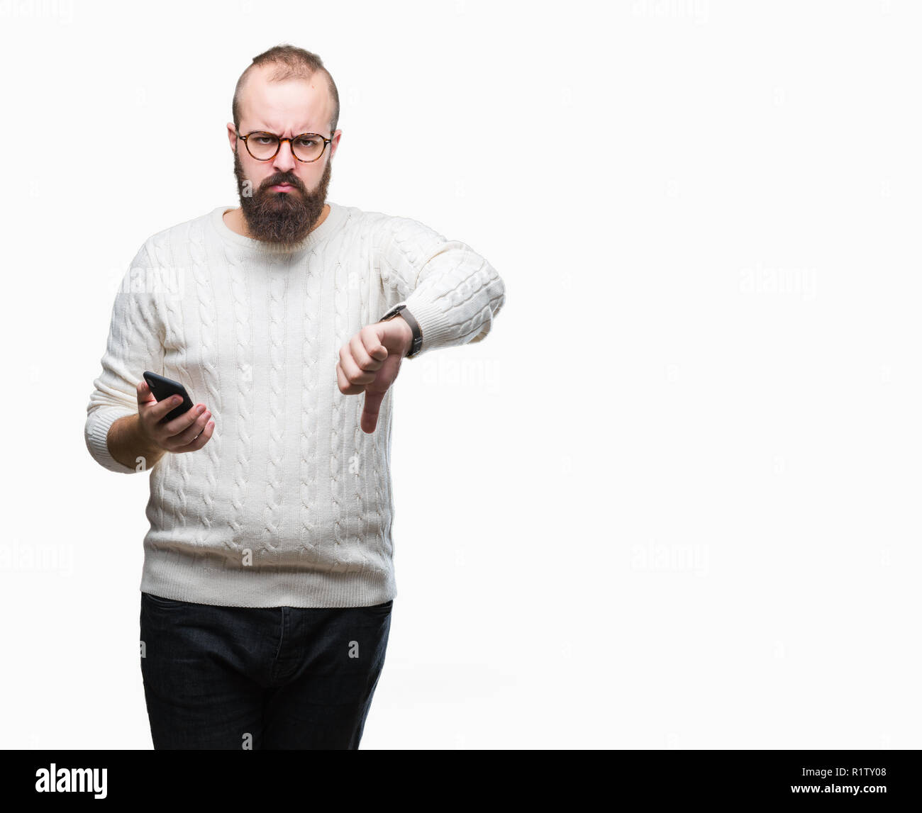 Young caucasian hipster man texting sending message using smartphone ...