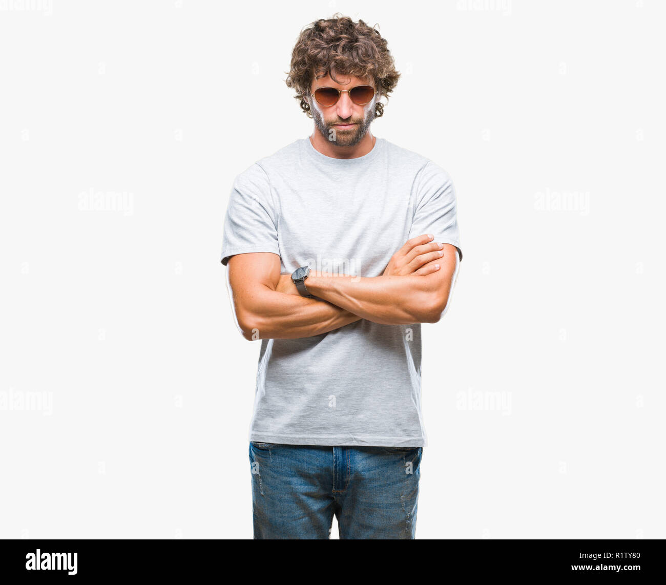 Handsome hispanic model man wearing sunglasses over isolated background ...