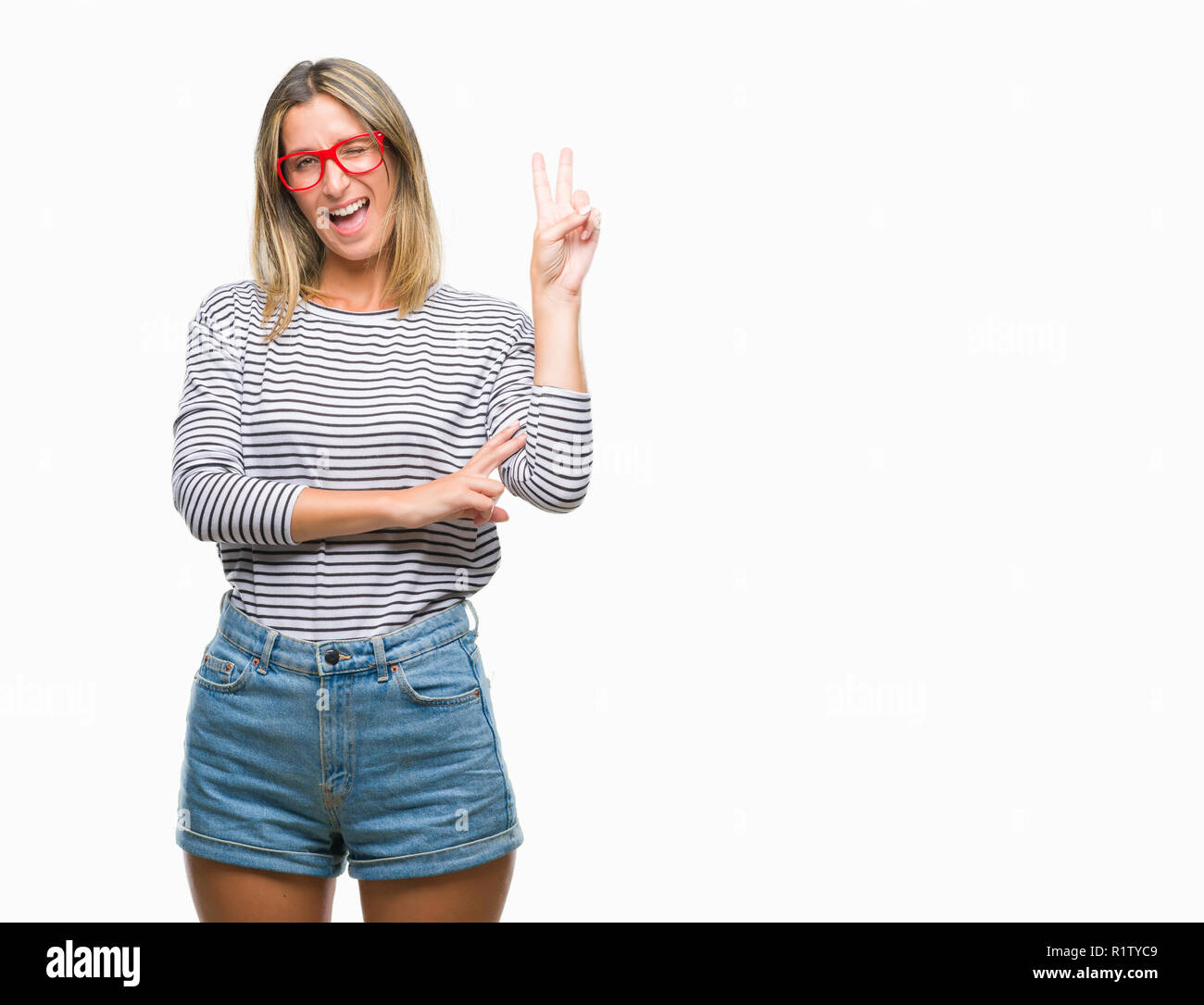 Hispanic beautiful woman winking face hi-res stock photography and ...