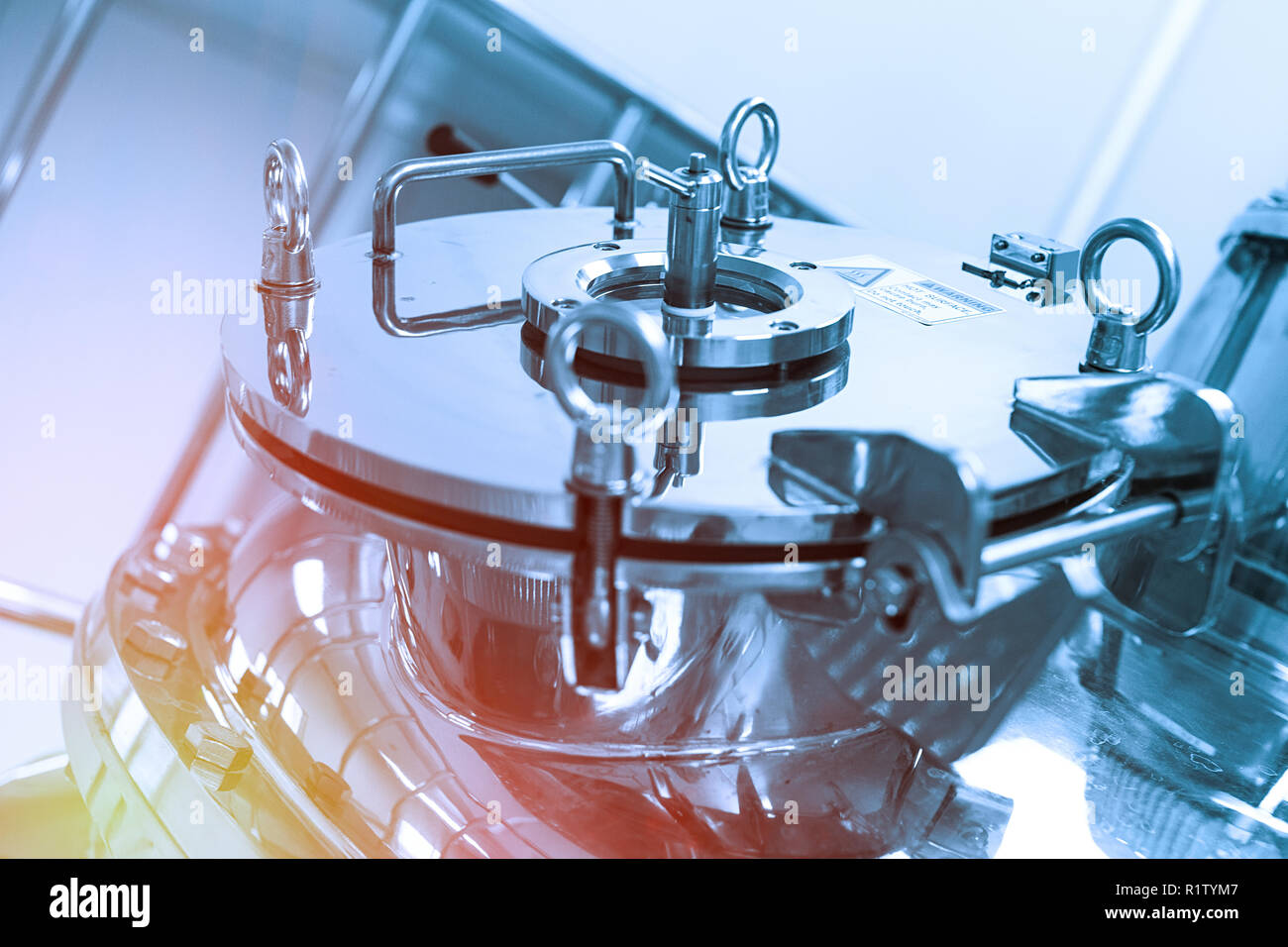 compression car on a big steel tank Stock Photo - Alamy