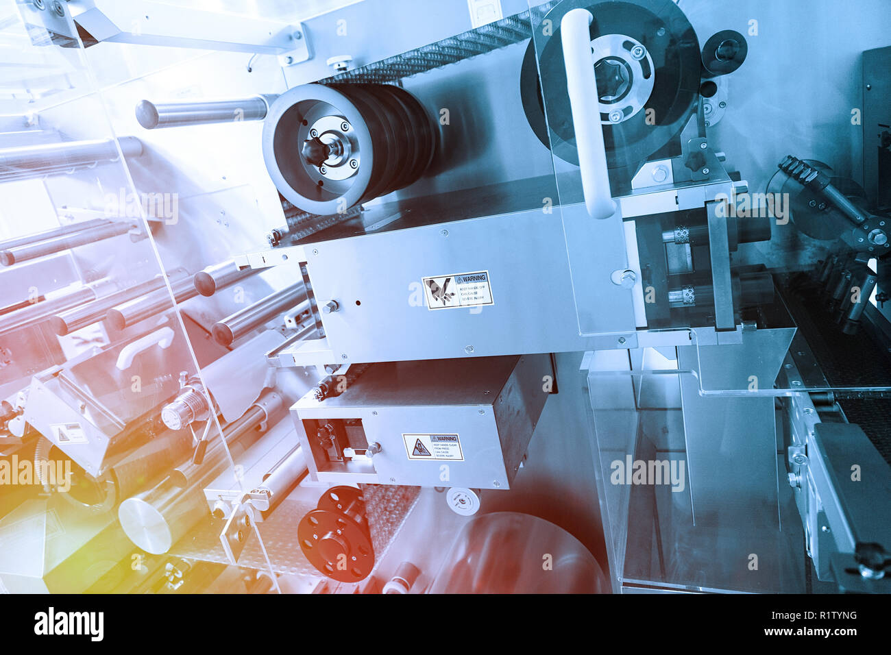 manufacture machine with shafts. Blue tone. Blue tint Stock Photo - Alamy