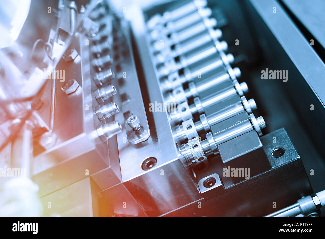 engine of machine with bolts and coils Stock Photo - Alamy