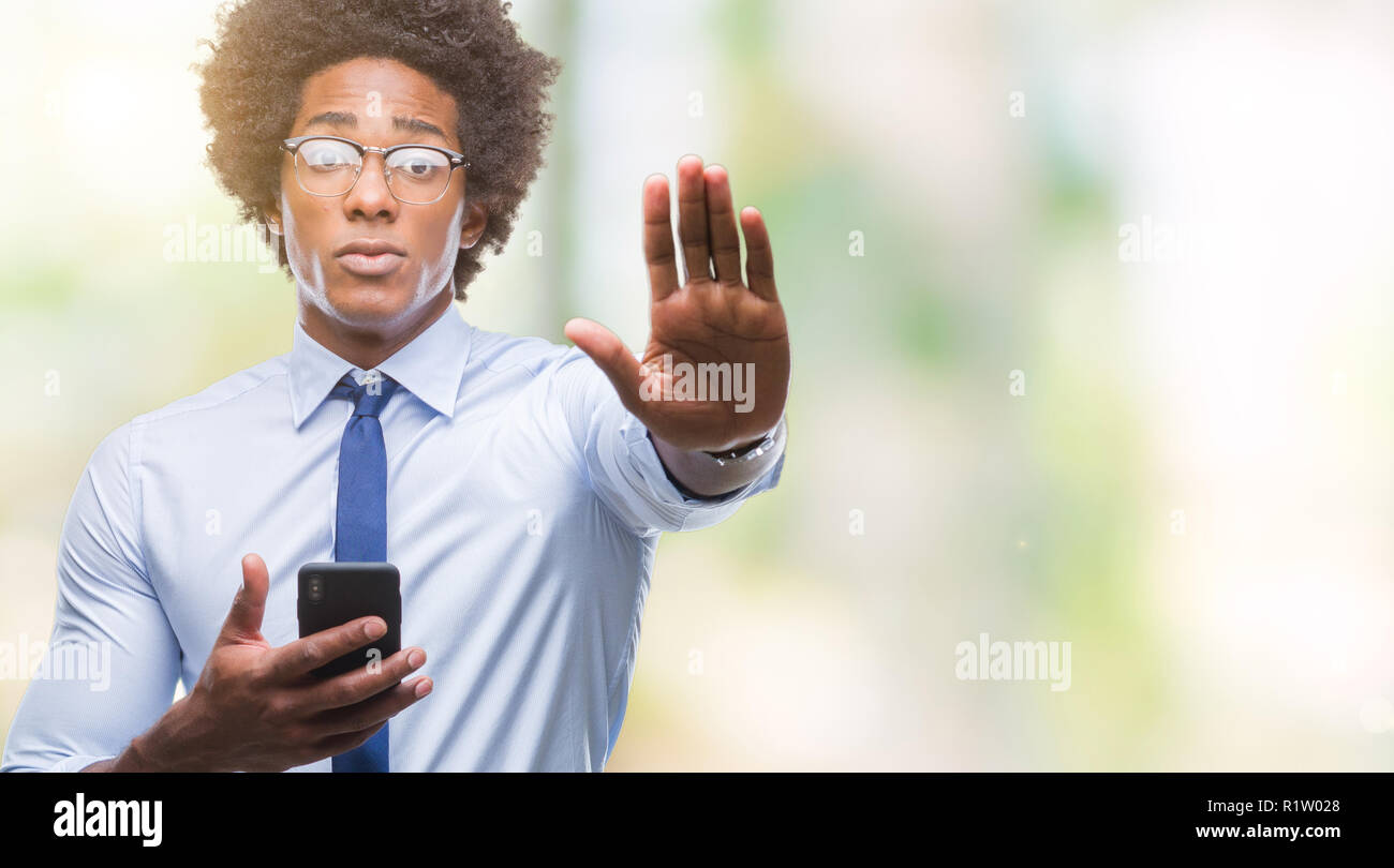 Afro american business man texting using smartphone over isolated ...