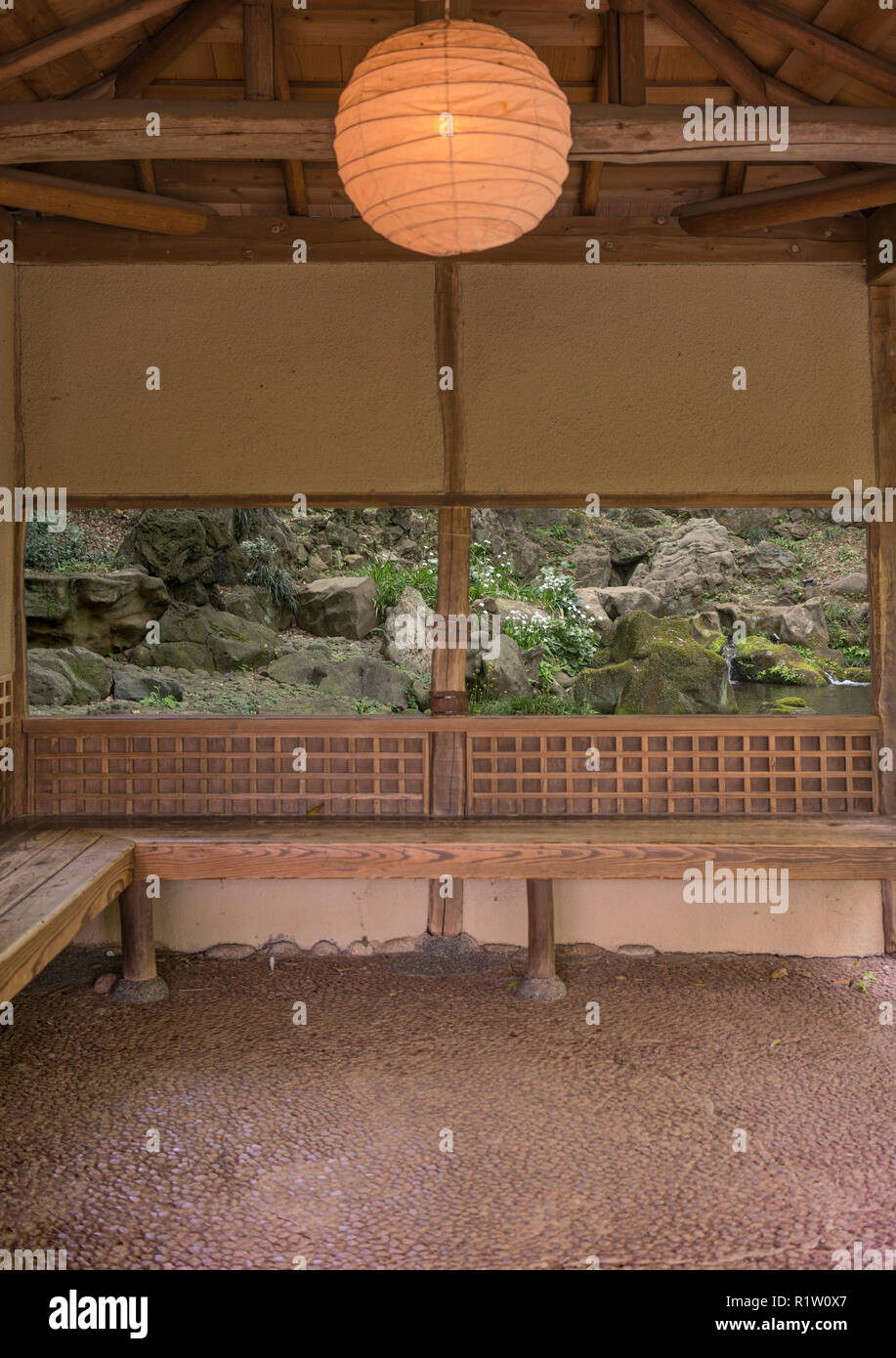 Takimi Japanese tea house lit by a lantern of washi paper overlooking a ...