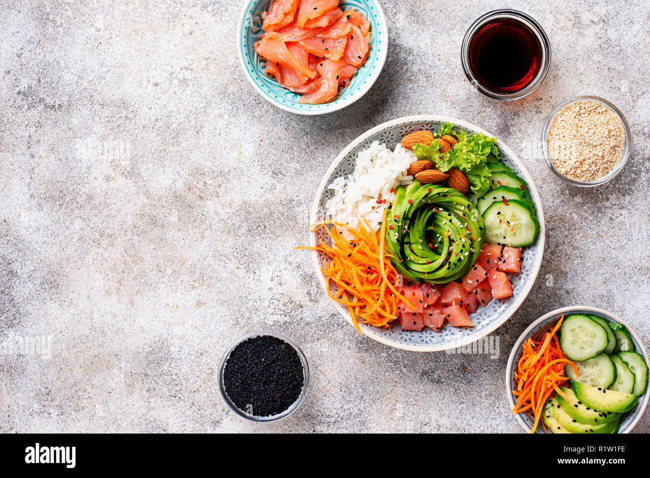 Hawaiian poke bowl with salmon, rice and vegetable Stock Photo - Alamy