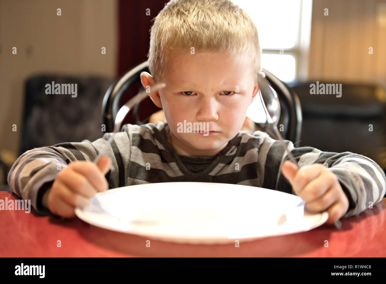 Angry kid dinner hi-res stock photography and images - Alamy