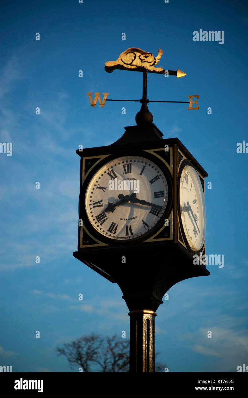 Large pubic clock tower with weather vane in shape of hi-res stock ...