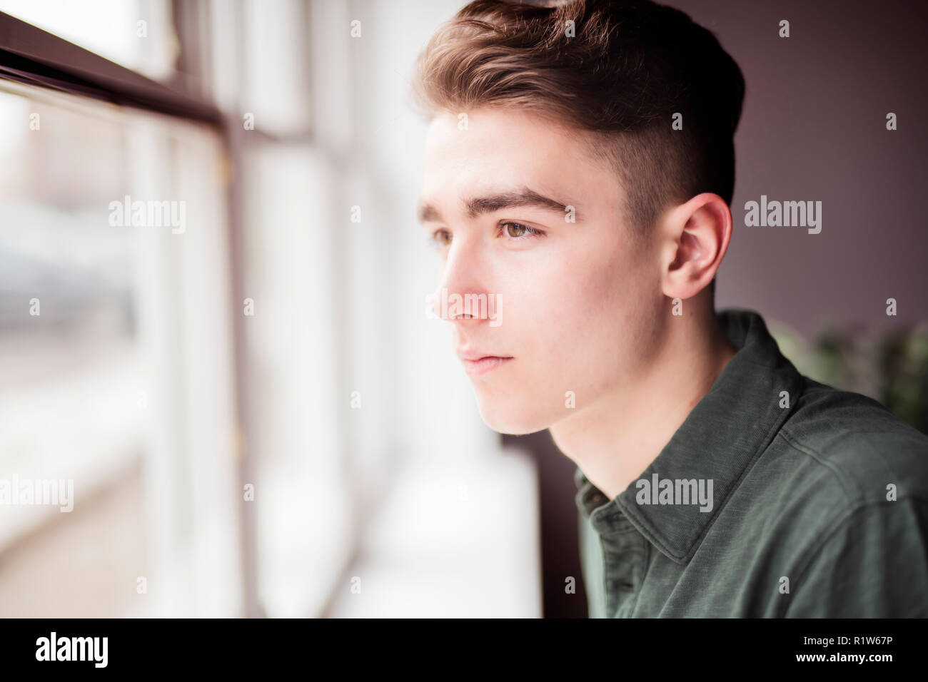 Man longing looking window hi-res stock photography and images - Alamy