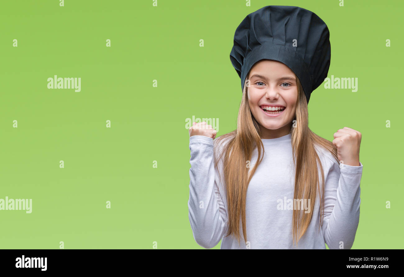 Young beautiful girl wearing chef hat uniform over isolated background ...