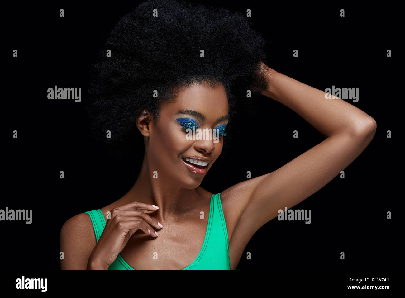 portrait of attractive african american model with bright blue eyes ...