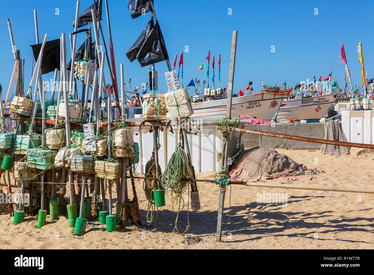 Local traditional style fishing boat with its fishing flags and floats ...