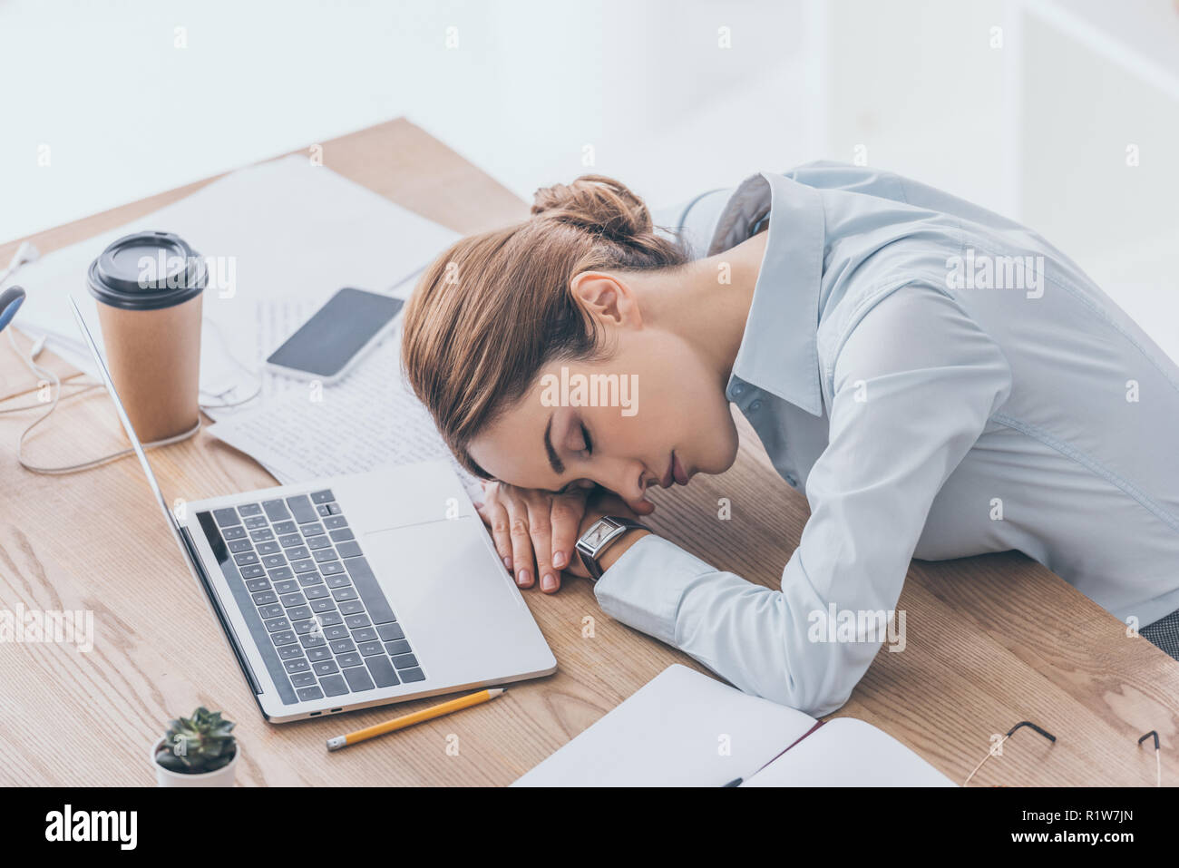 Exhausted female manager workplace hi-res stock photography and images ...