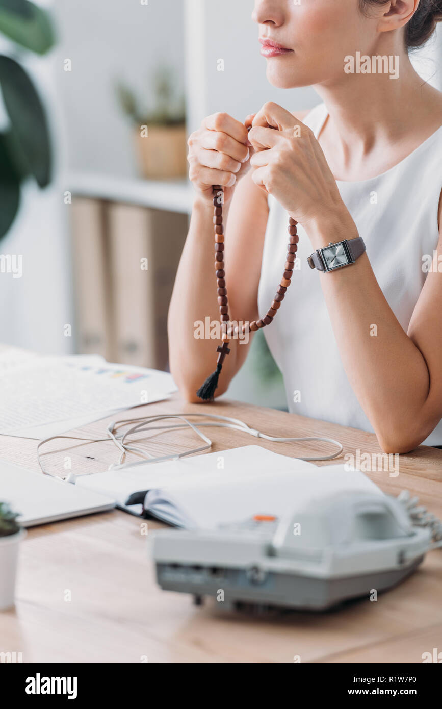 Praying office woman hi-res stock photography and images - Alamy