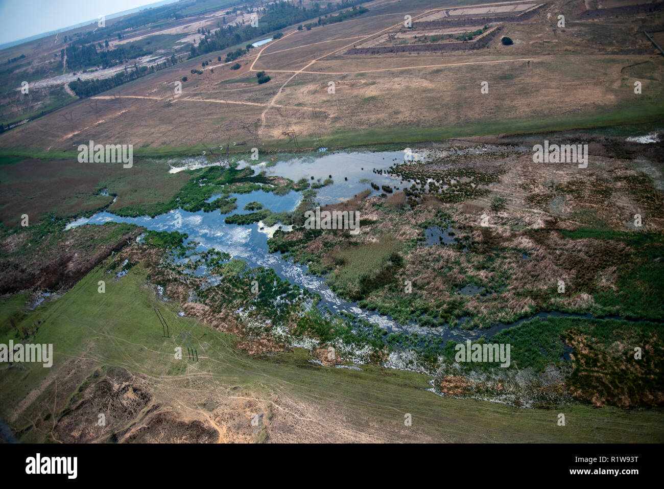 Aerial showing the environmental impact of mining on natural resources ...
