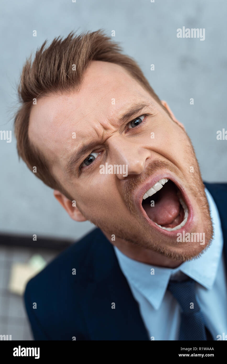 Man yelling office hi-res stock photography and images - Alamy