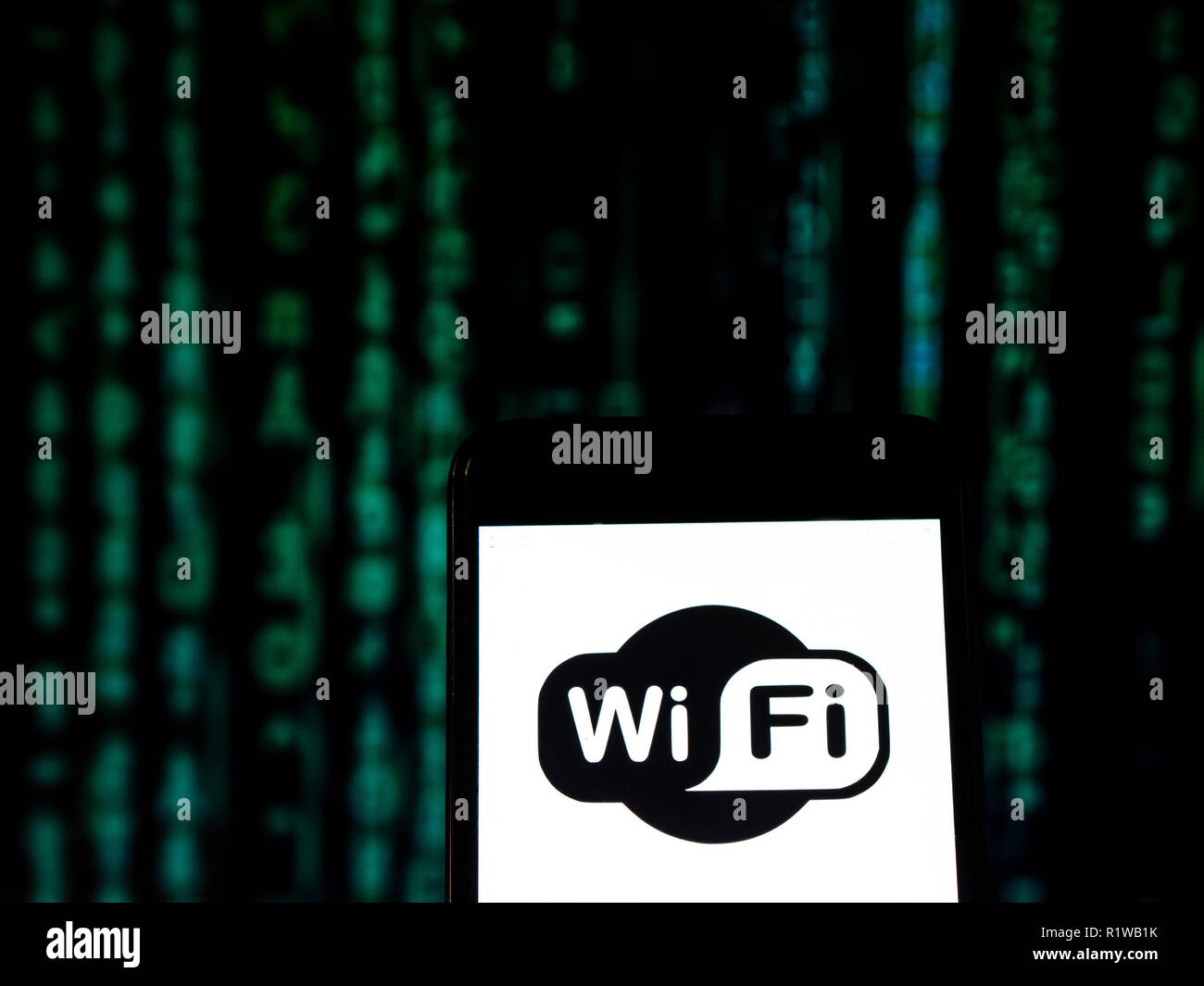 Wi-Fi logo seen displayed on smart phone. Wi-Fi is technology for radio ...