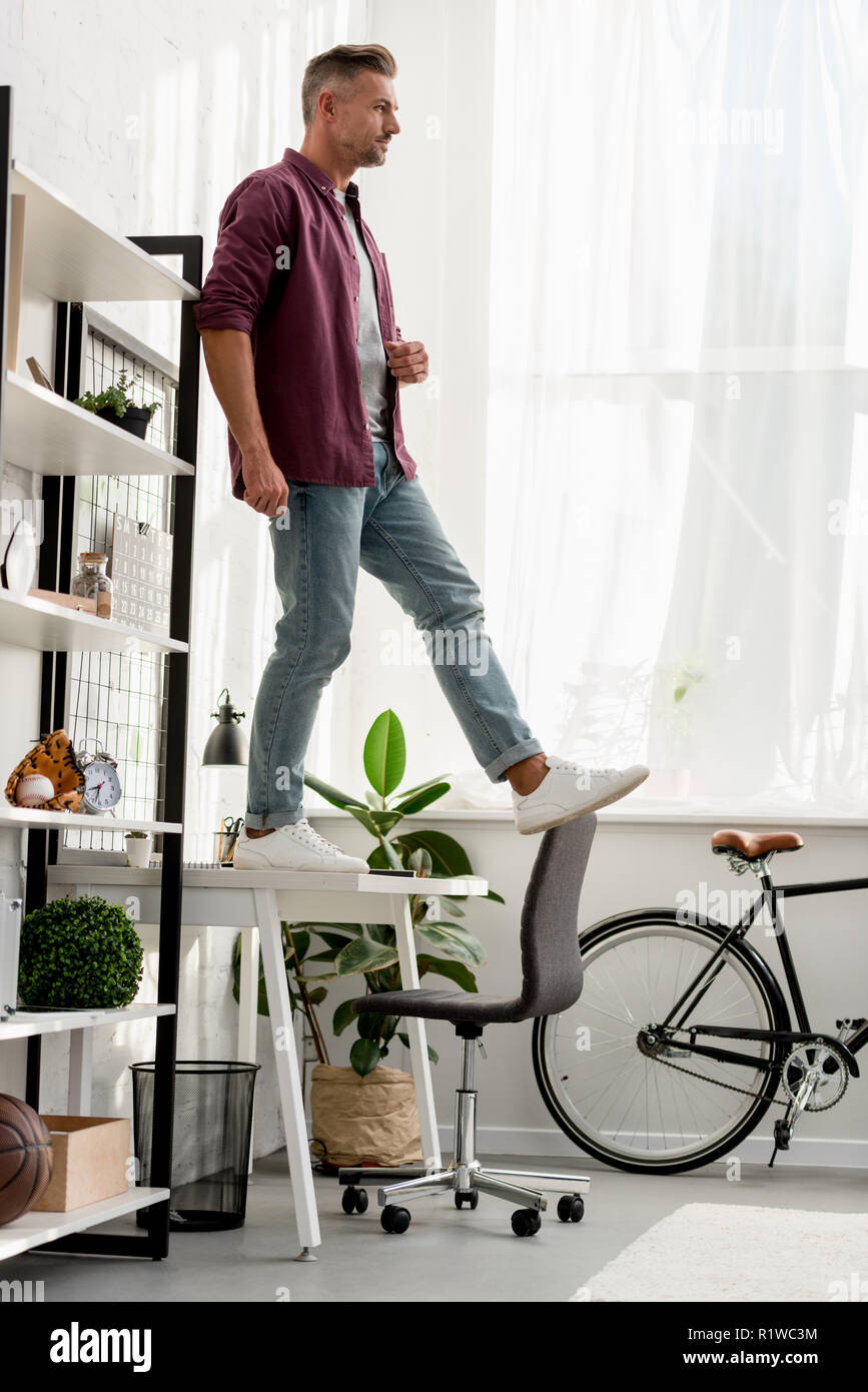 Man stepping off hi-res stock photography and images - Alamy