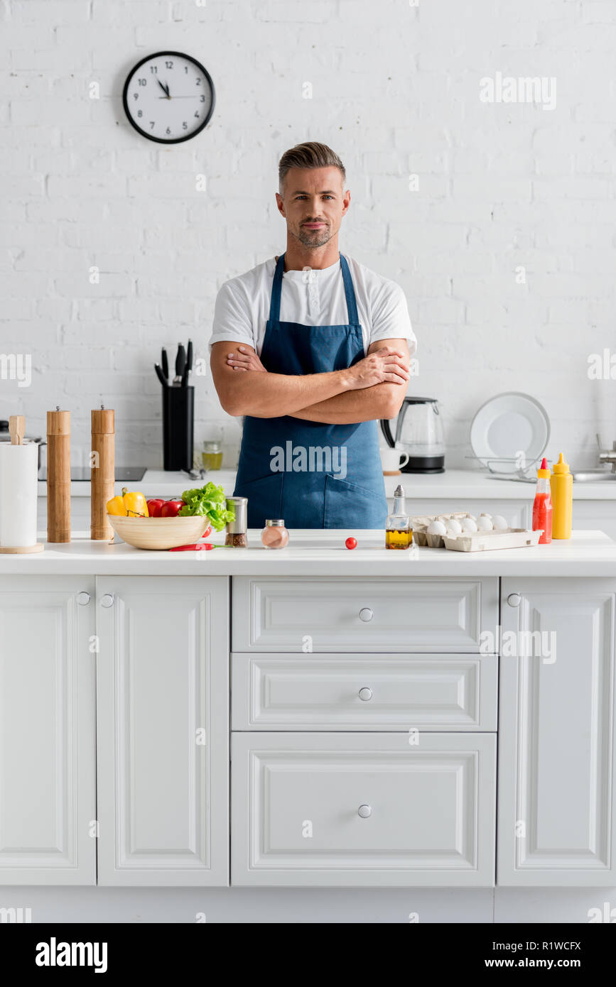 Handsome man in apron hi-res stock photography and images - Alamy
