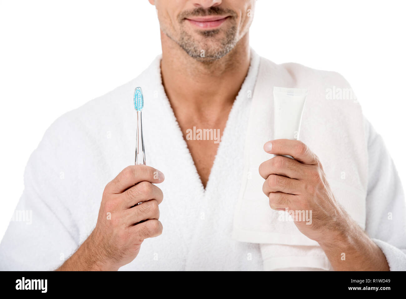 Man holding toothbrush toothpaste on hi-res stock photography and ...