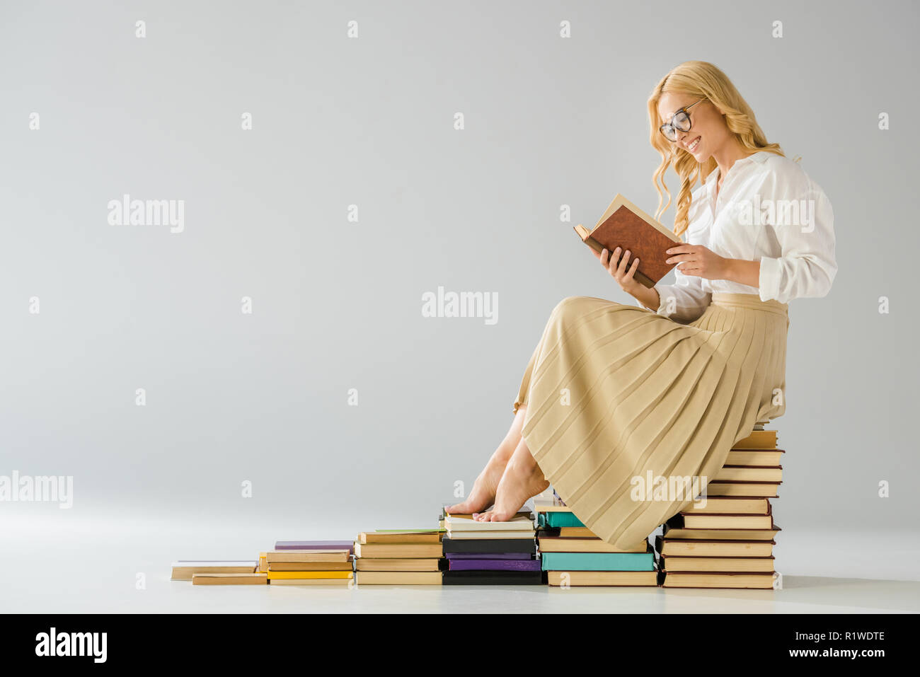Woman Sitting Barefoot On Steps High Resolution Stock Photography and ...