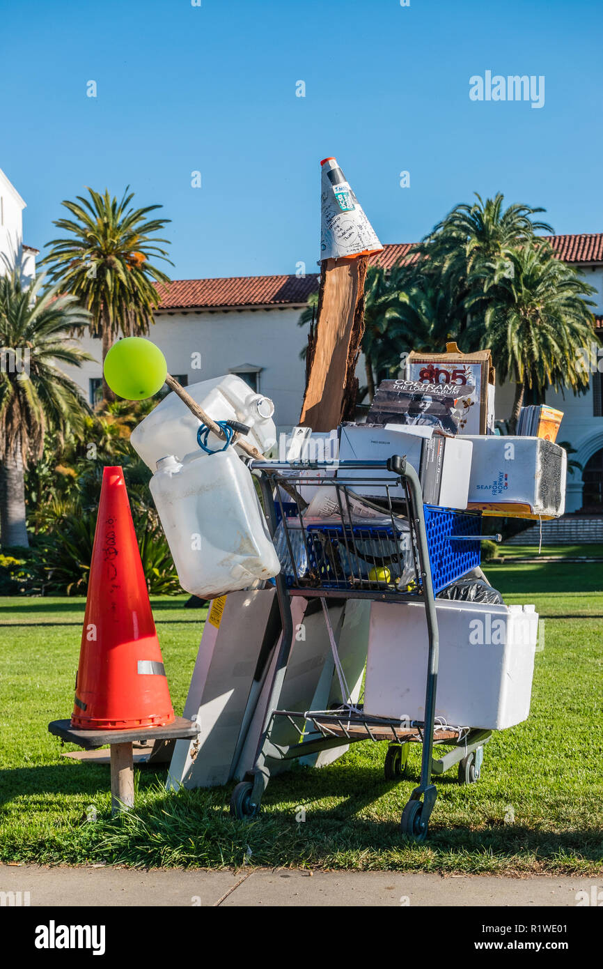 A shopping cart loaded with belongings of a homeless person, parked in ...