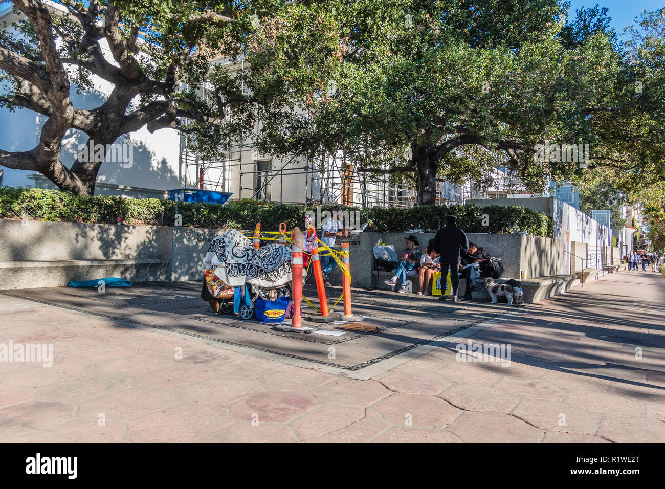Group of homeless people gathered at the corner of Anapanu and State ...