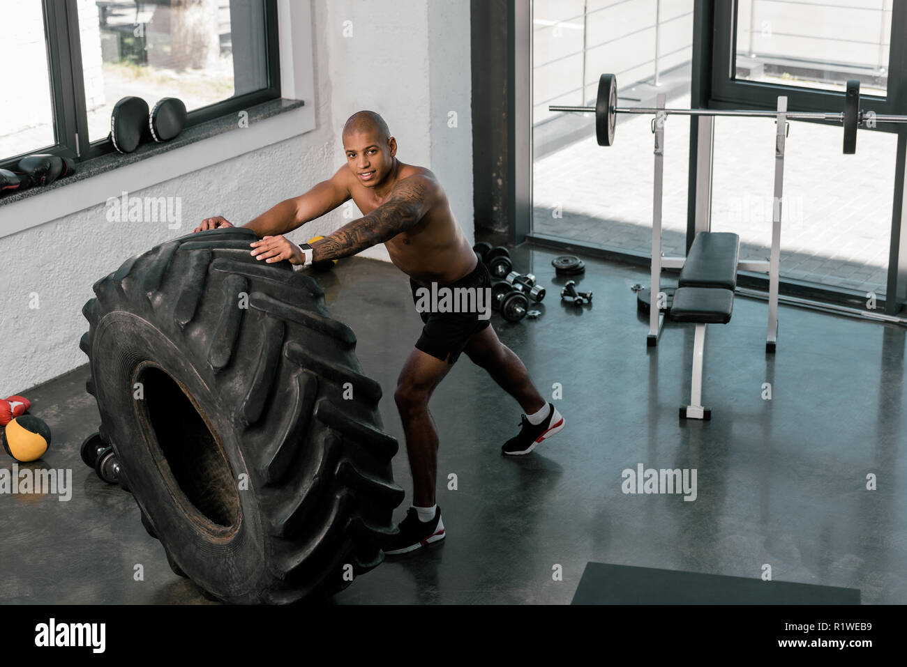 Strong man exercising gym muscular sport hi-res stock photography and ...