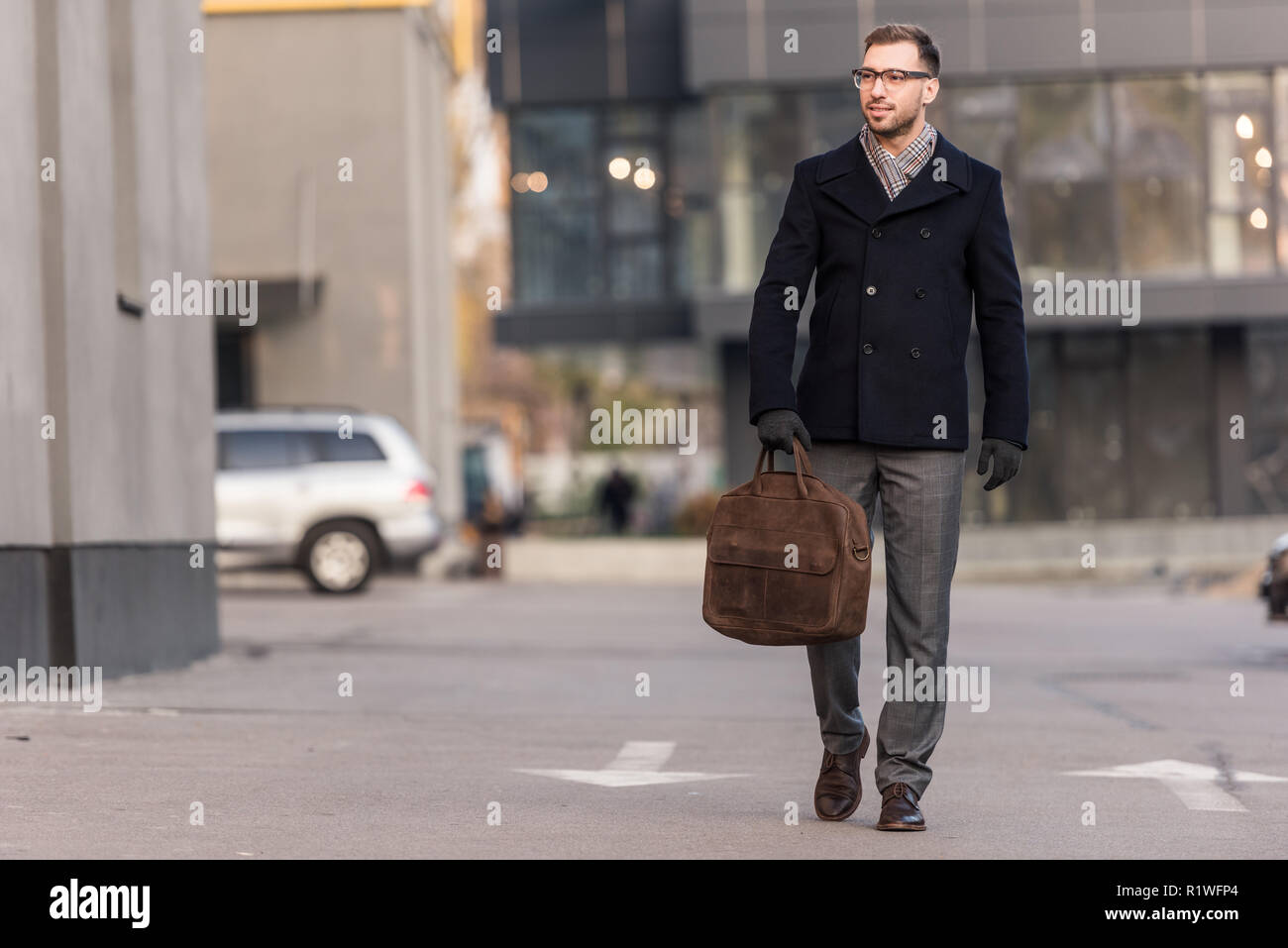 Handsome man walking along hi-res stock photography and images - Alamy