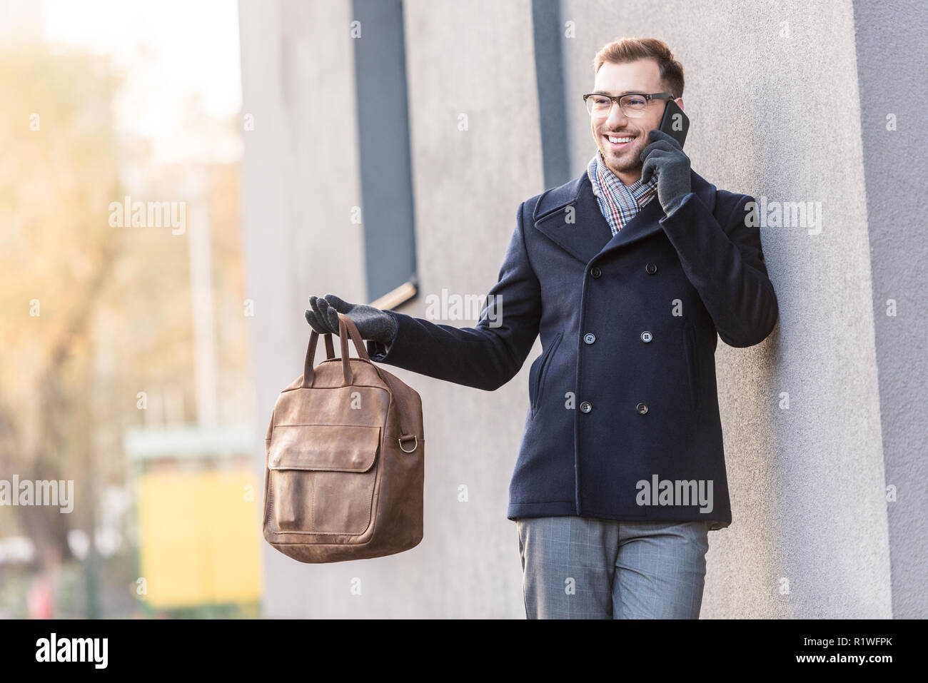 Handsome smiling man talking hi-res stock photography and images - Alamy