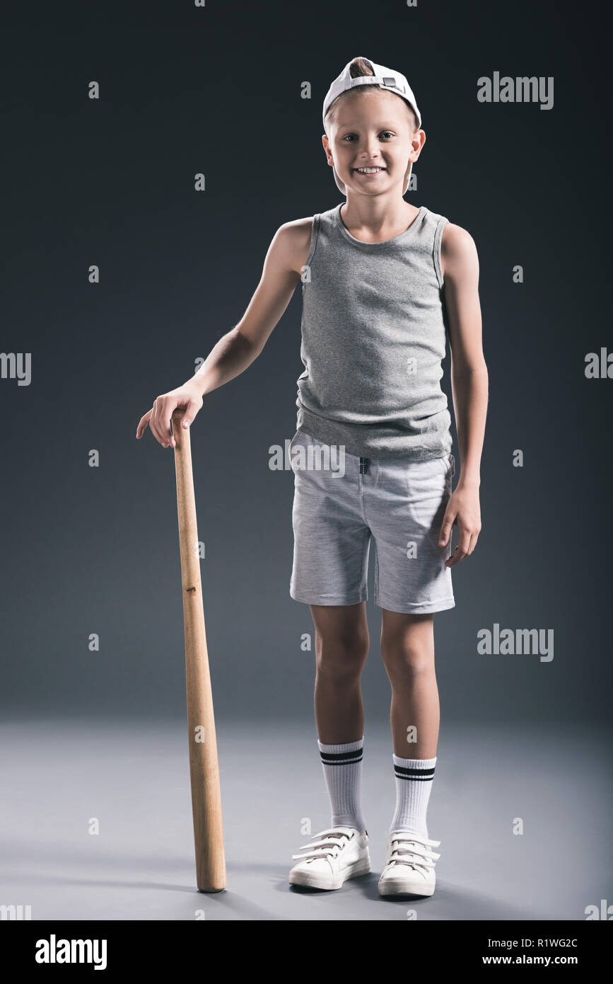 Boy with bat hi-res stock photography and images - Alamy