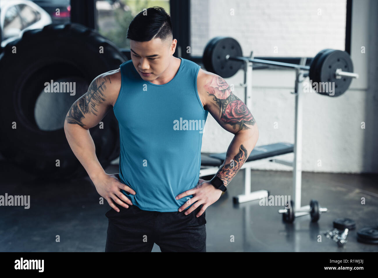 Male athlete hands on hips hi-res stock photography and images - Alamy