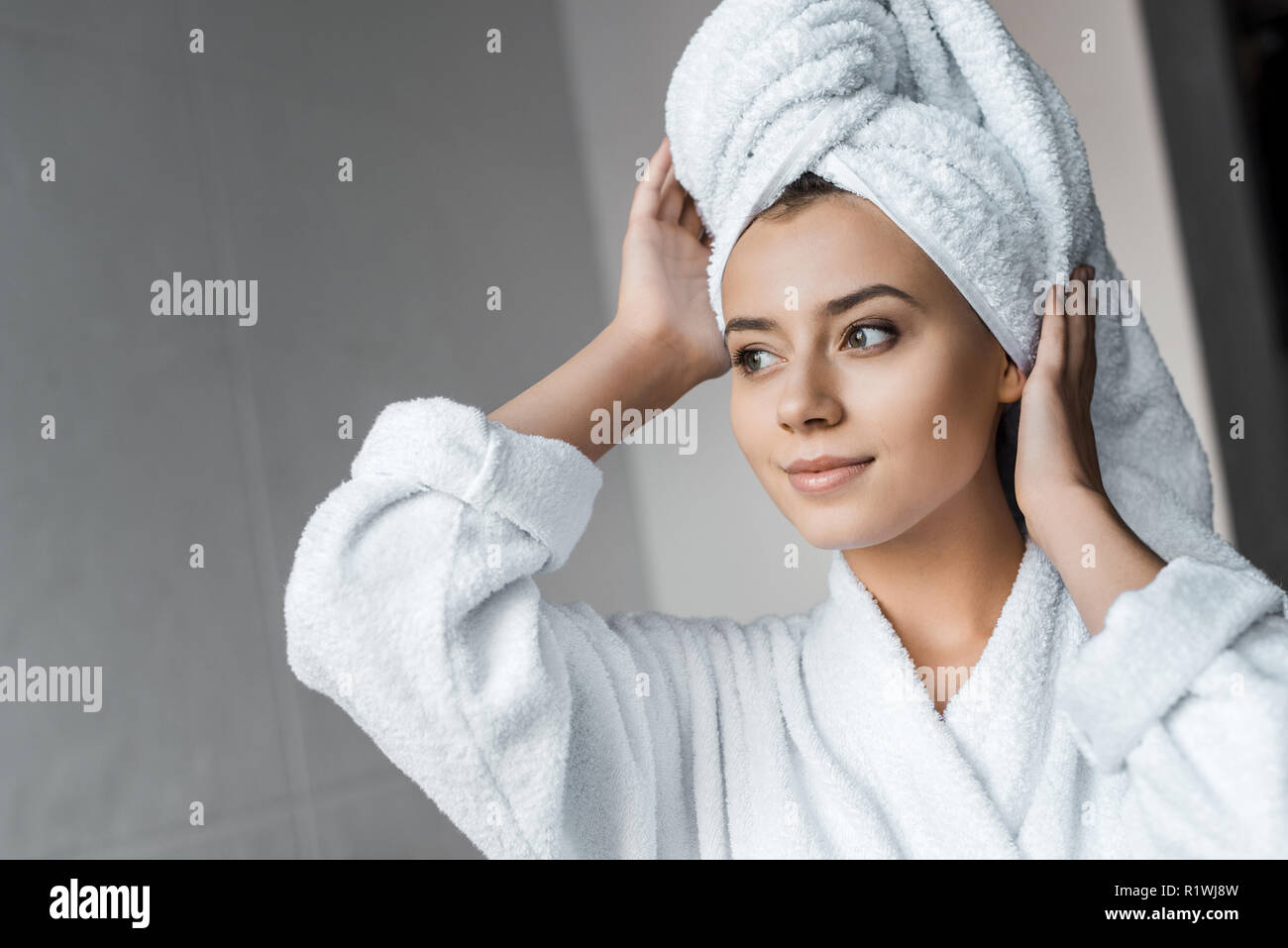 Woman wearing bathrobe towel head hi-res stock photography and images ...