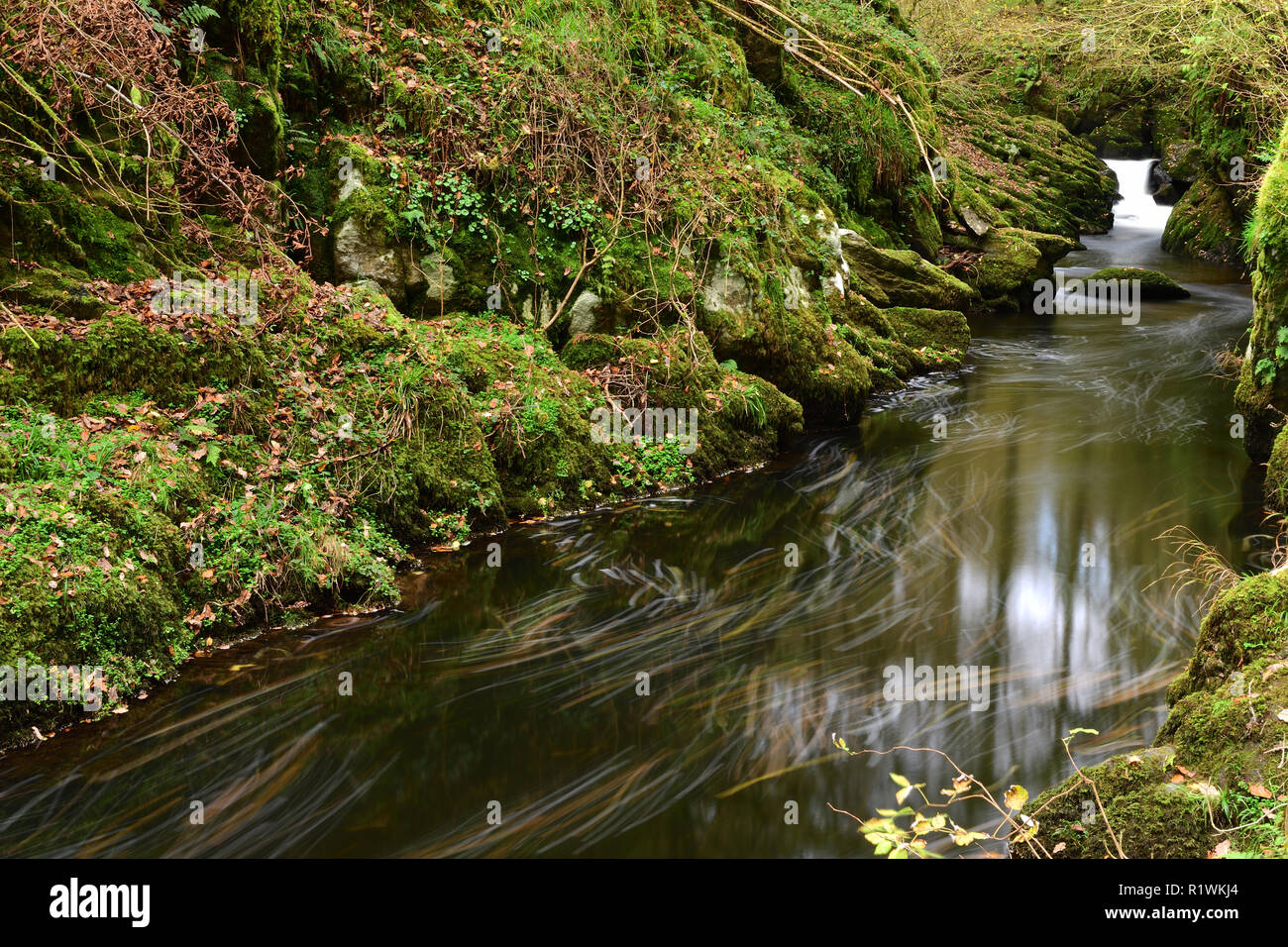 Long exposure of the river flowing through long pool at Watersmeet in ...
