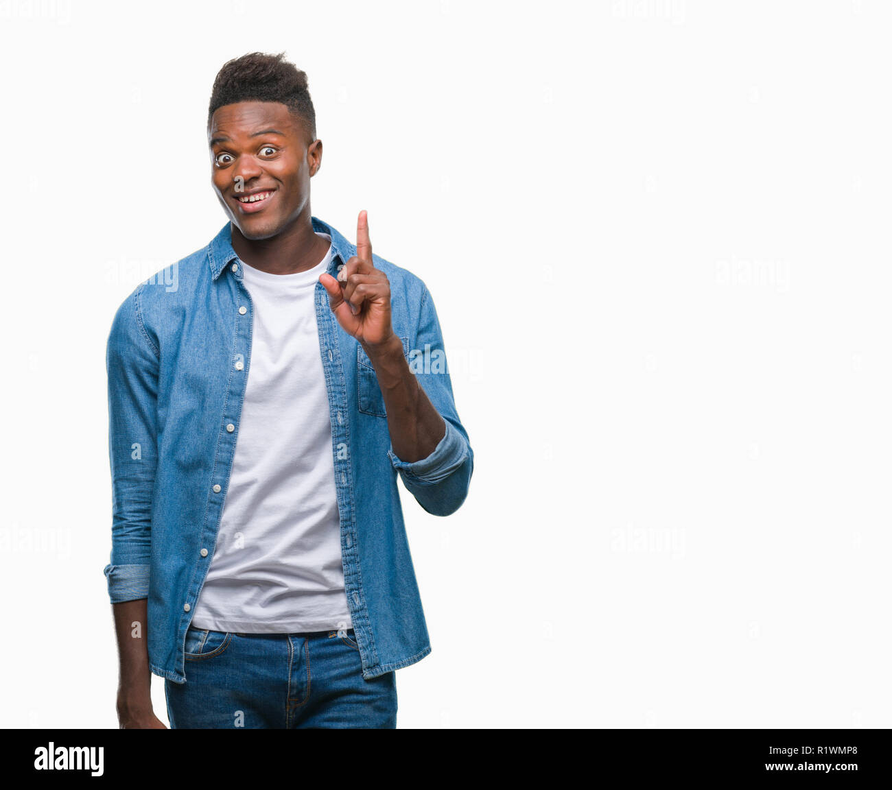 Young african american man over isolated background pointing finger up ...