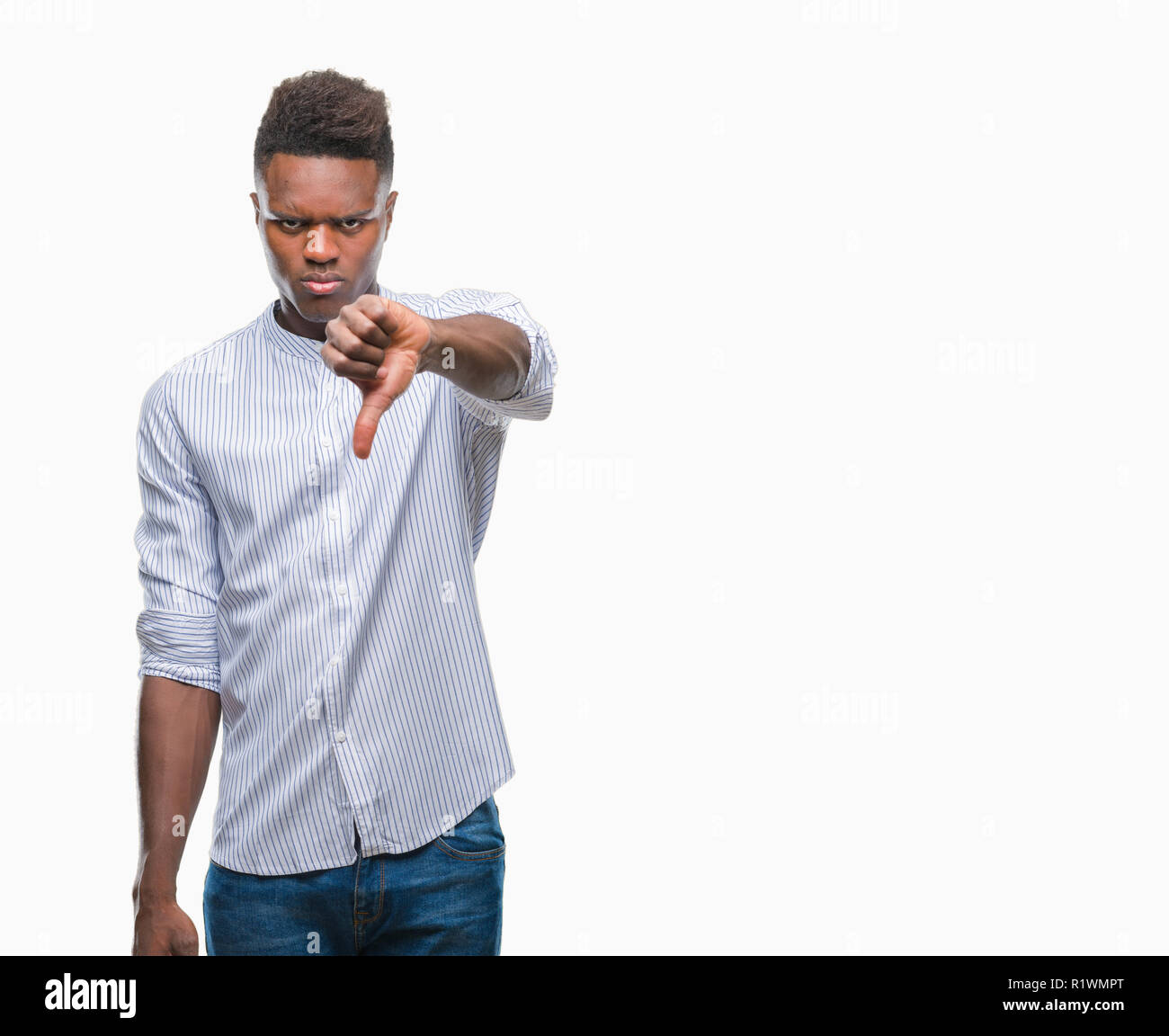 Young african american man over isolated background looking unhappy and ...