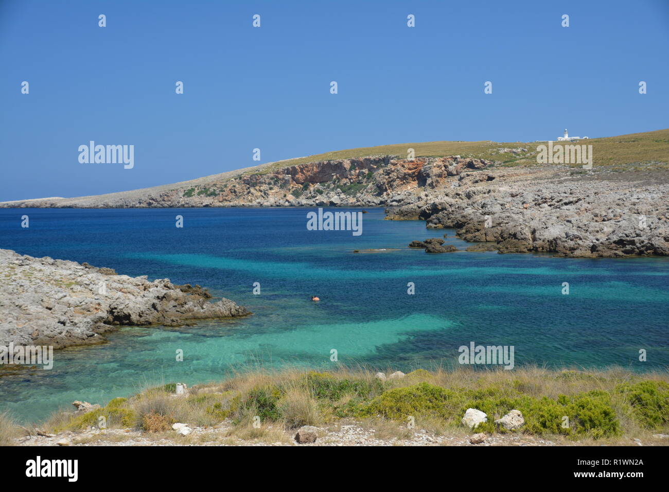 Menorca beach paradise crystal clear sea water Stock Photo - Alamy