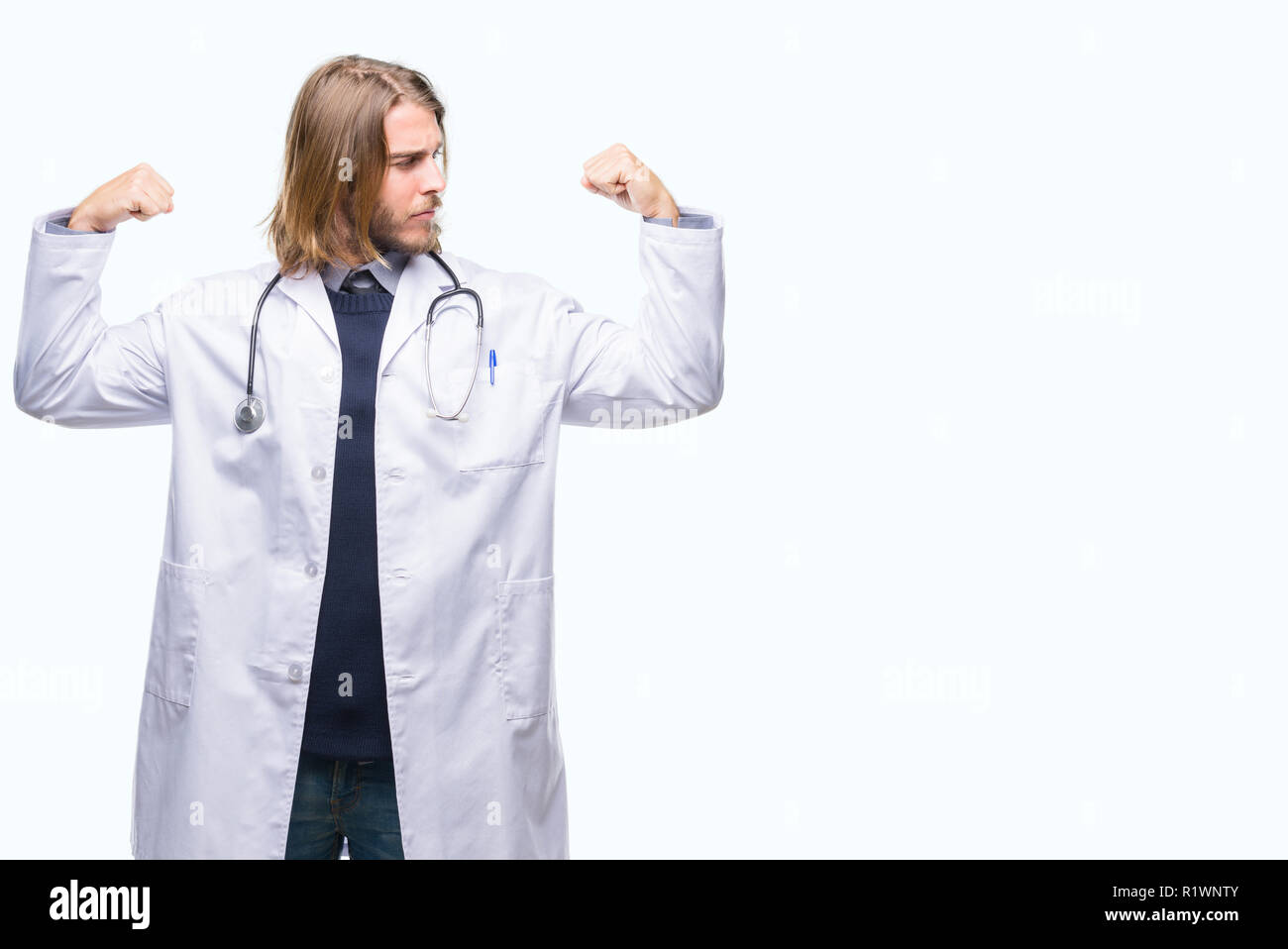 Young handsome doctor man with long hair over isolated background ...