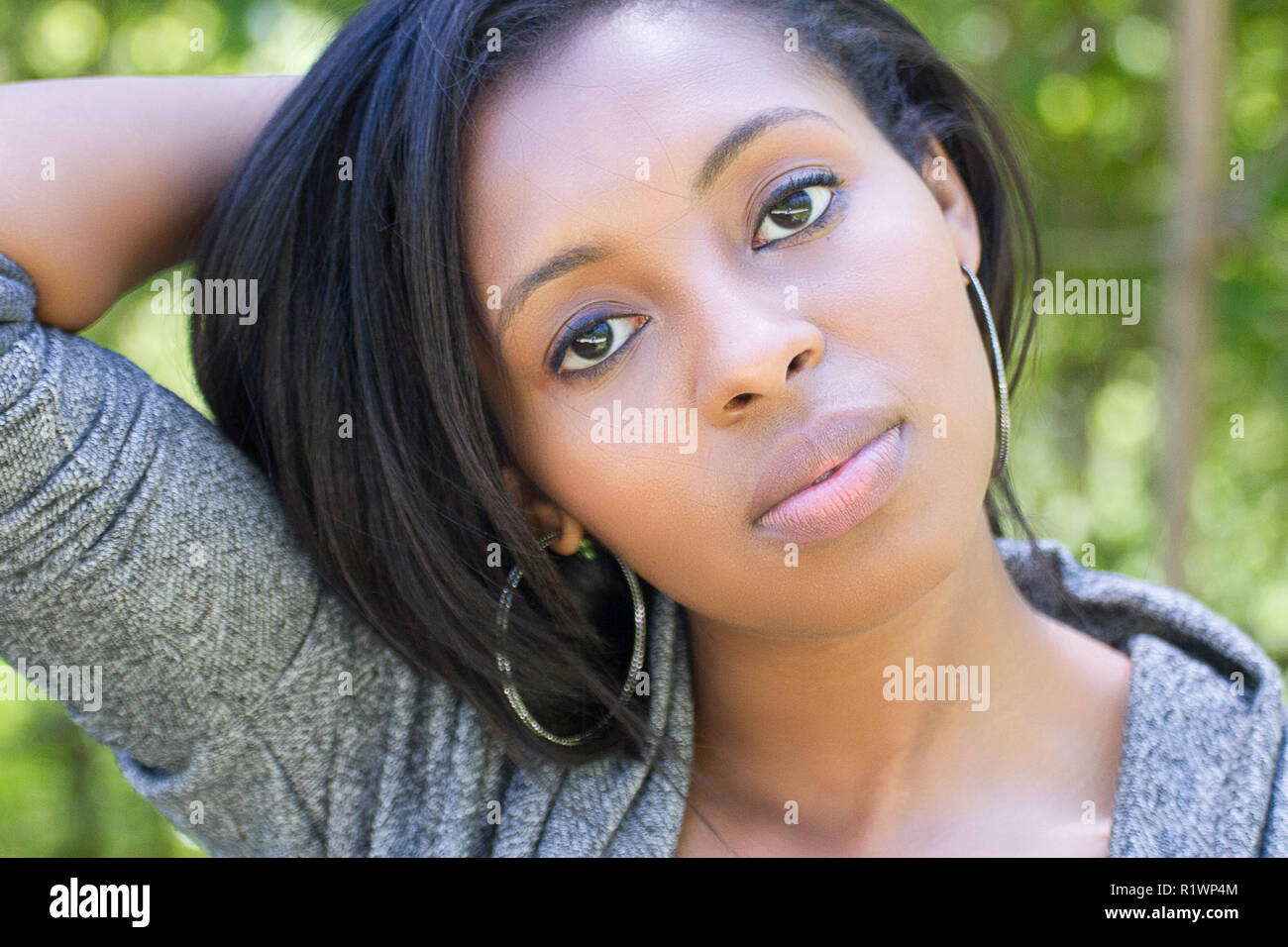 Woman with the head tilted hi-res stock photography and images - Alamy