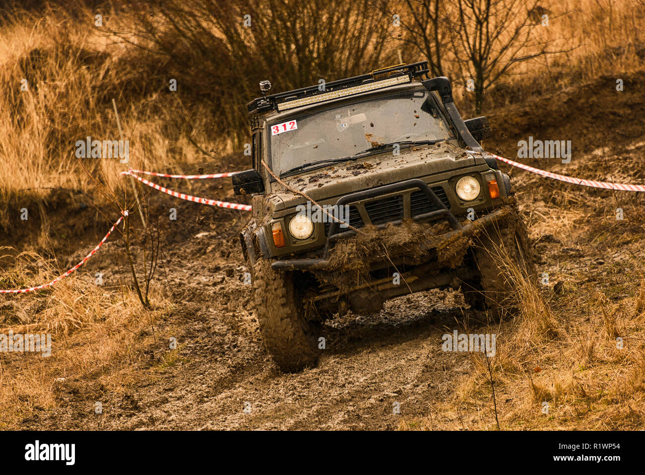 Off road car overcomes the track Stock Photo - Alamy