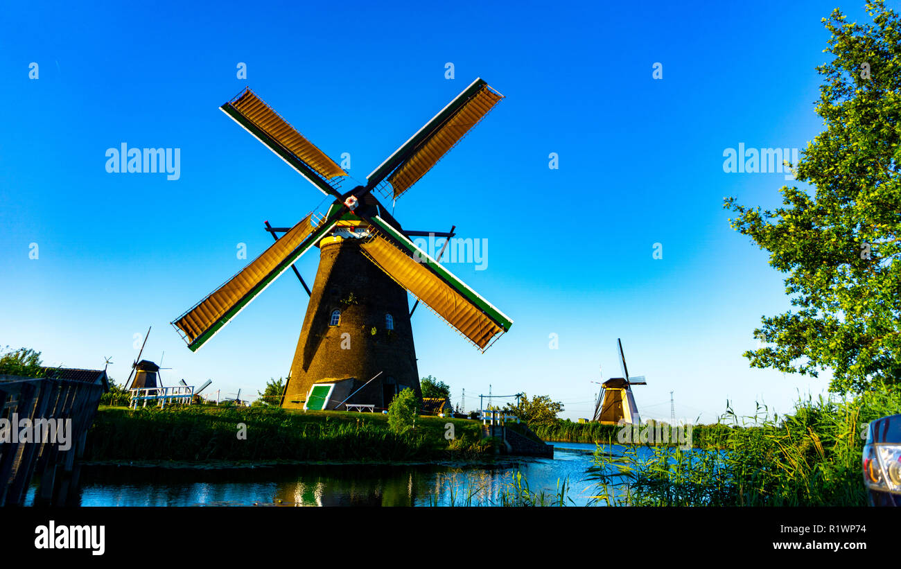 Dutch windmill during sunset nederlands Stock Photo - Alamy