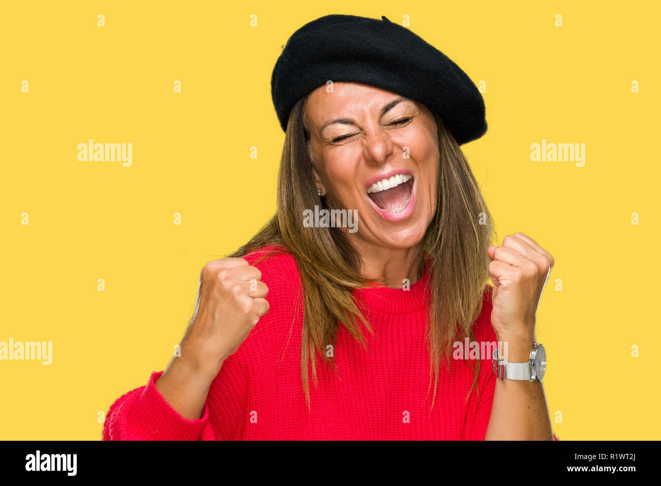 Middle age adult woman wearing fashion beret over isolated background ...