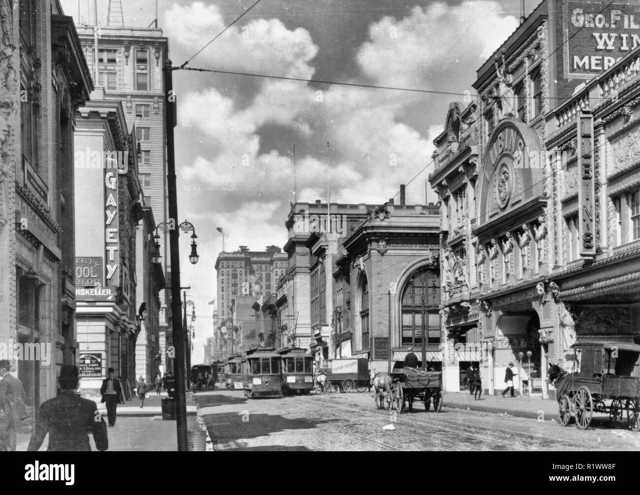 Lubins Building and business district, Photograph shows carts, wagons ...