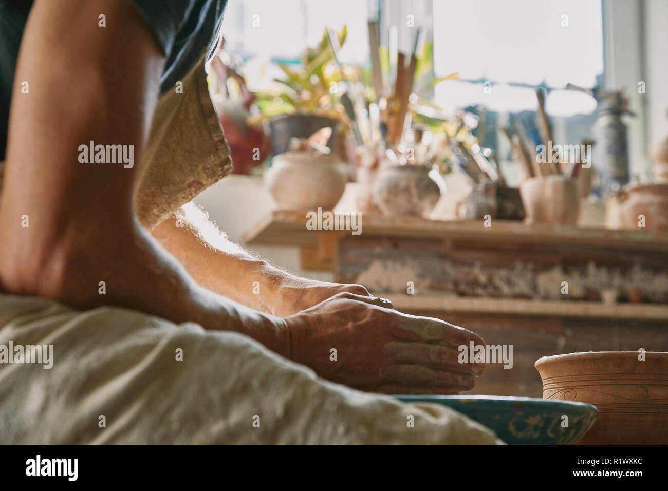 Professional male potter making ceramics hi-res stock photography and ...