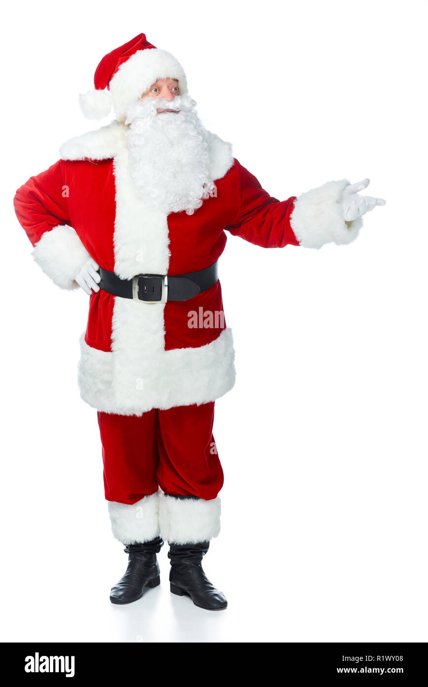 santa claus in red costume presenting something isolated on white Stock ...